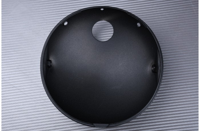 Casing for round headlight casing, to be adapted